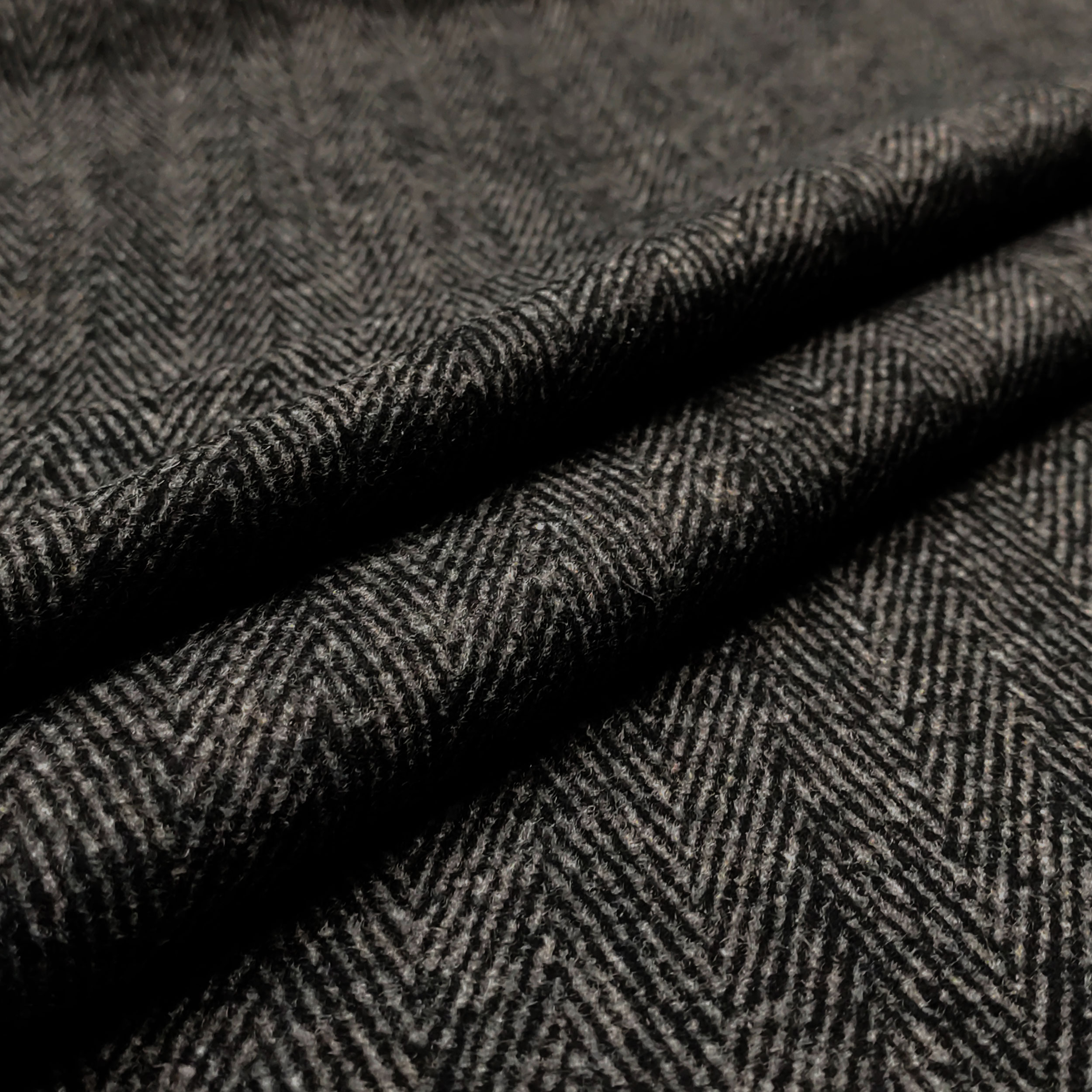 Tessuto per Cappotto Spigato in Grigio e Nero